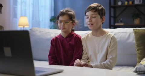 Happy children talking to webcam during ... | Stock Video | Pond5