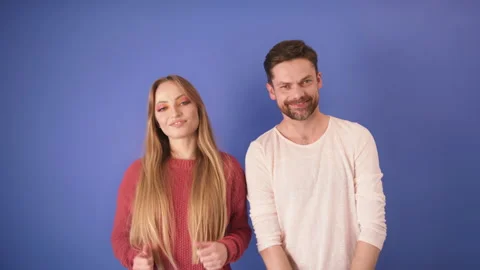 Happy couple approve and showing thumbs ... | Stock Video | Pond5