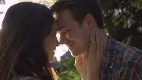 Happy Couple Kiss, Backlit, Beautiful In... | Stock Video | Pond5