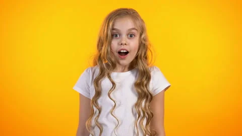 Happy cute girl making yes gesture, surp... | Stock Video | Pond5