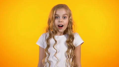 Happy cute girl making yes gesture, surp... | Stock Video | Pond5