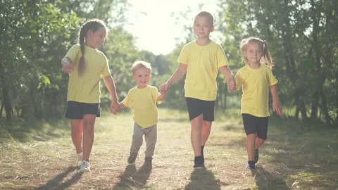 Happy family in forest park. Children ru... | Stock Video | Pond5