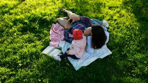 Happy family is laying on the pled and d... | Stock Video | Pond5