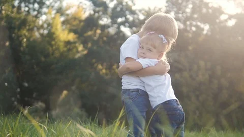 Happy family: little kid boy hugs circli... | Stock Video | Pond5