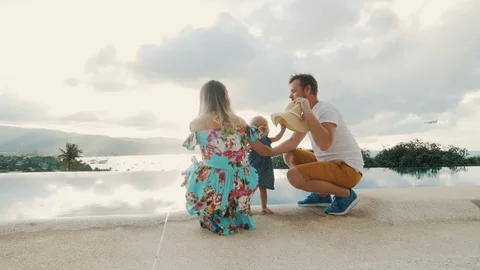 Happy family on outdoor balcony with inf... | Stock Video | Pond5
