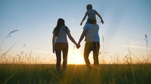 Happy family in the park. Teamwork. Grou... | Stock Video | Pond5