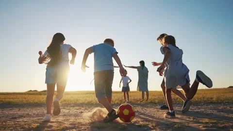 happy family playing ball in the park. a... | Stock Video | Pond5