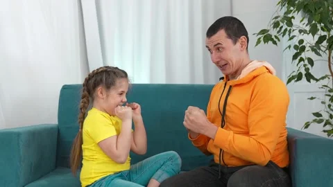 happy family teamwork. dad daughter clap... | Stock Video | Pond5