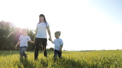 happy family teamwork mother, little bro... | Stock Video | Pond5