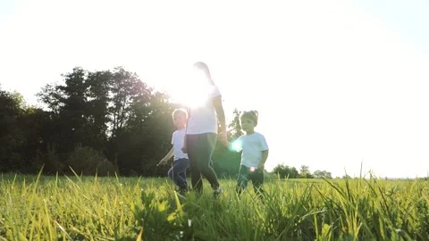 happy family teamwork mother, little bro... | Stock Video | Pond5