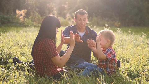 happy family teamwork outdoors concept o... | Stock Video | Pond5