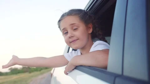 happy girl kid child smile leaned out of... | Stock Video | Pond5