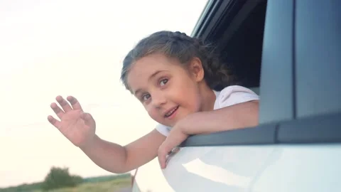 happy girl kid child smile leaned out of... | Stock Video | Pond5