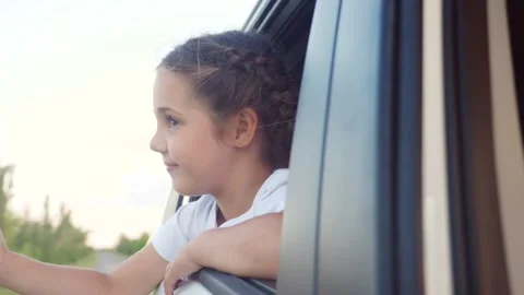 happy girl kid child smile leaned out of... | Stock Video | Pond5