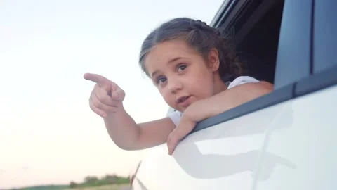 happy girl kid child smile leaned out of... | Stock Video | Pond5