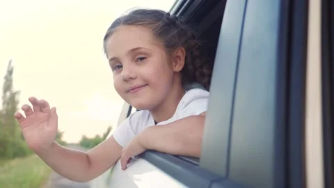 happy girl kid child smile leaned out of... | Stock Video | Pond5