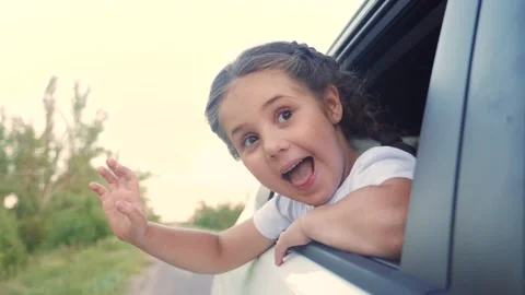 happy girl kid child smile leaned out of... | Stock Video | Pond5