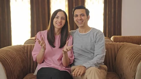Happy Indian couple talking to the camer... | Stock Video | Pond5