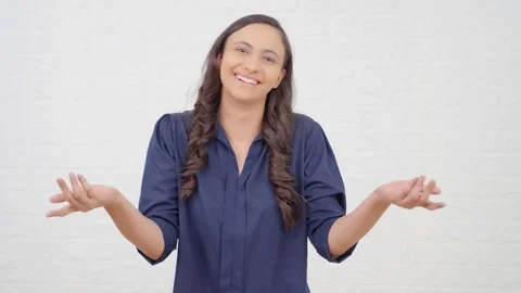 Happy Indian girl asking questions | Stock Video | Pond5