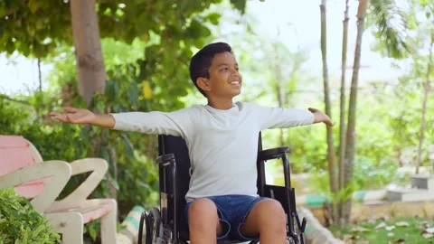 Happy indian kid with disability feeling... | Stock Video | Pond5