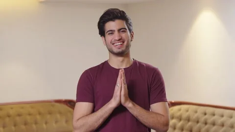 Happy Indian man doing Namaste with a bi... | Stock Video | Pond5