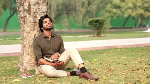 Happy Indian Student Thinking about Some... | Stock Video | Pond5