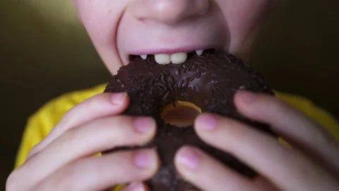 Kid Eating Donut Stock Videos – Royalty-Free HD & 4K Videos