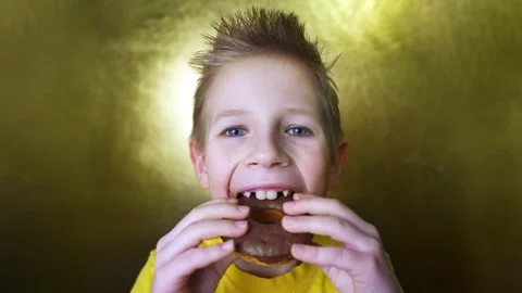 Kid Eating Donut Stock Videos – Royalty-Free HD & 4K Videos