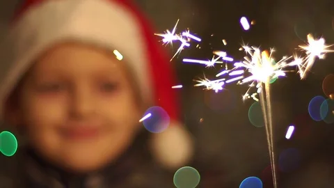 Happy Kid Enjoying The Fire Sparks Of Be... | Stock Video | Pond5