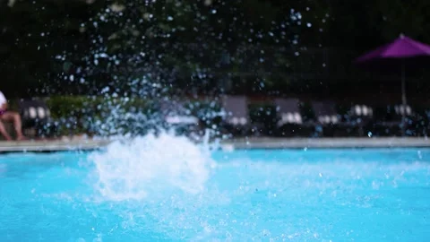 happy kid jumping in pool, having fun on... | Stock Video | Pond5