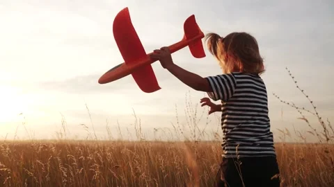 happy kids childs run with an airplane i... | Stock Video | Pond5