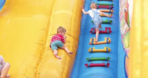 Happy kids having a lots of fun on a col... | Stock Video | Pond5