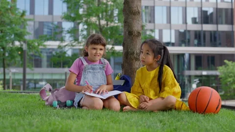 Happy kids playing and talking together ... | Stock Video | Pond5