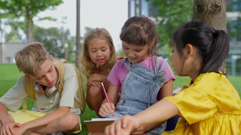 Happy kids playing and talking together ... | Stock Video | Pond5