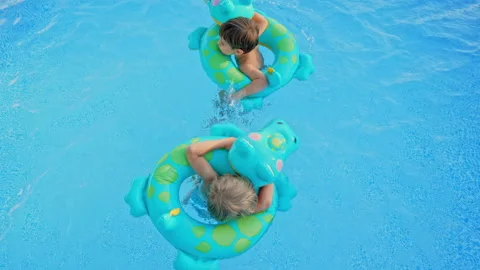 Happy little boys circle synchronously i... | Stock Video | Pond5