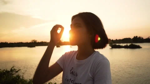 Happy little girl looking up at sky in s... | Stock Video | Pond5