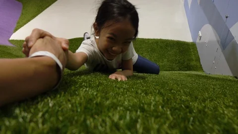 Happy little girl reaching for a helping... | Stock Video | Pond5