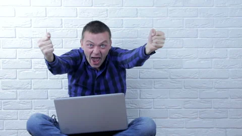 Happy man screams with happiness, celebr... | Stock Video | Pond5