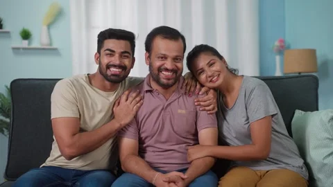 Happy middle aged Indian father with sib... | Stock Video | Pond5