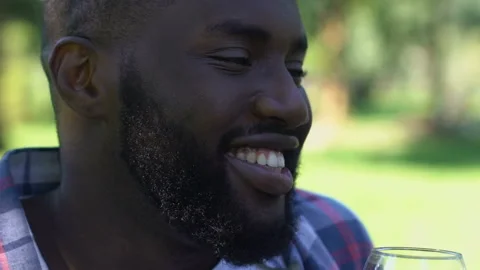 Happy mixed race couple kissing and clin... | Stock Video | Pond5