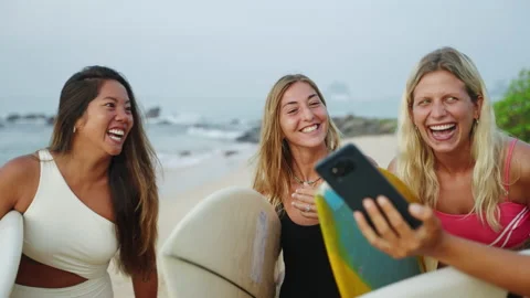 Happy multiracial surfer girls in bikini... | Stock Video | Pond5