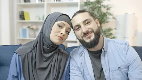 Happy muslim couple leaning foreheads, s... | Stock Video | Pond5