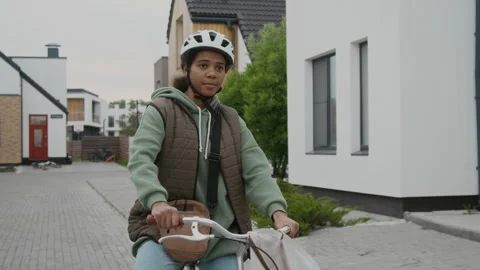 Happy Newspaper Delivery Girl Riding Bik... | Stock Video | Pond5