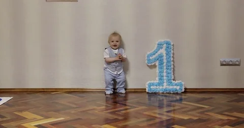 A happy one year old boy celebrating bir... | Stock Video | Pond5