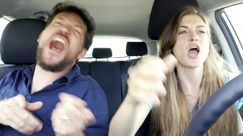 Happy people dancing like crazy in car d... | Stock Video | Pond5