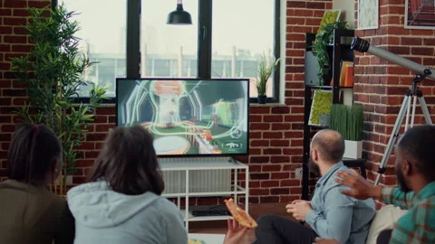 Happy people winning video games competi... | Stock Video | Pond5