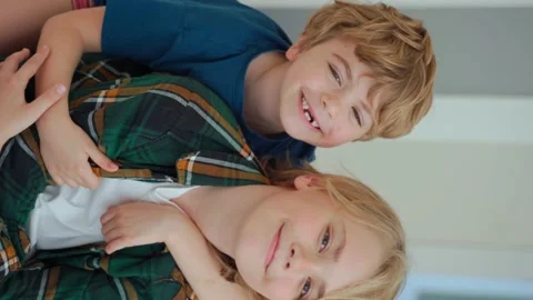 Happy siblings playing together fool aro... | Stock Video | Pond5