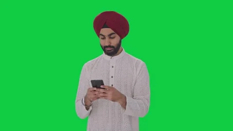 Happy Sikh Indian man texting someone Gr... | Stock Video | Pond5