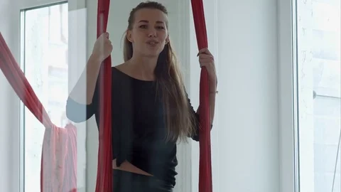 Happy smiling pole dancer talking to a c... | Stock Video | Pond5