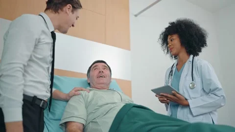 A happy son visits a recovering old fath... | Stock Video | Pond5